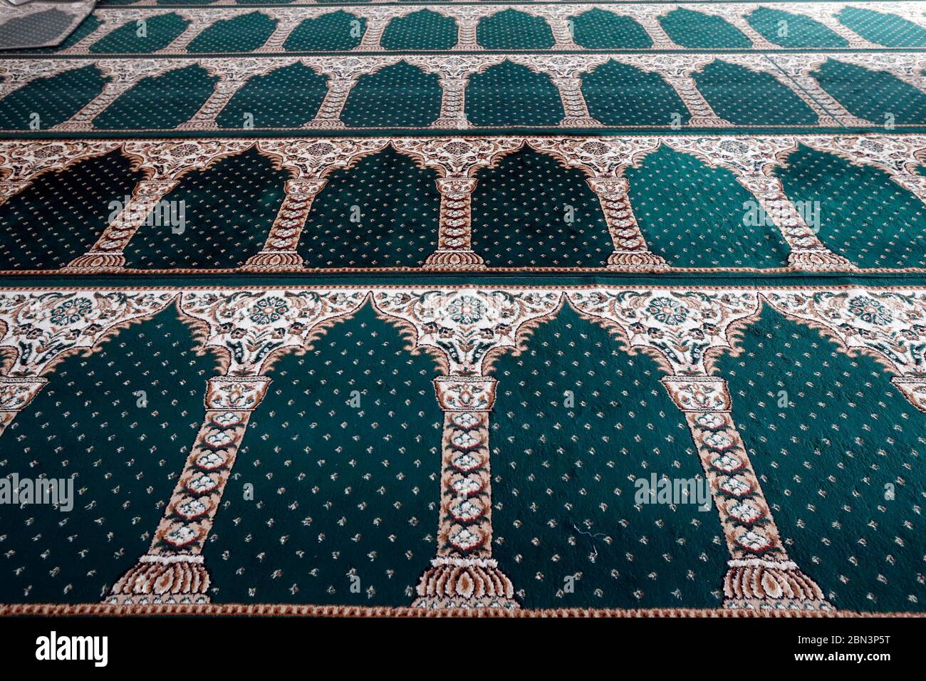 Masjid Ar-Rohmah mosque. Prayer hall with green carpet. Chau Doc ...