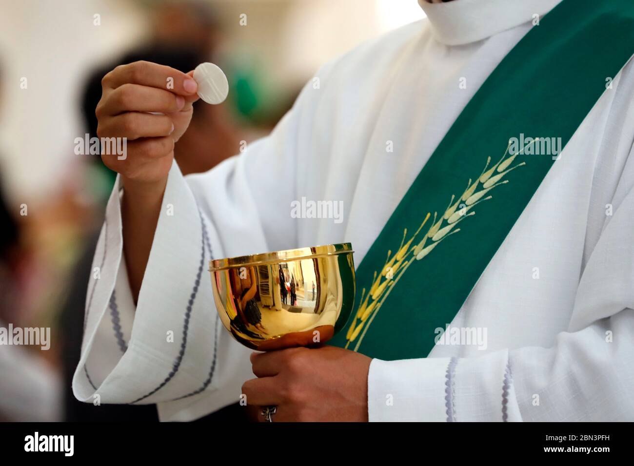 Catholic church. Sunday mass. Holy communion. Ho Chi Minh City. Vietnam ...