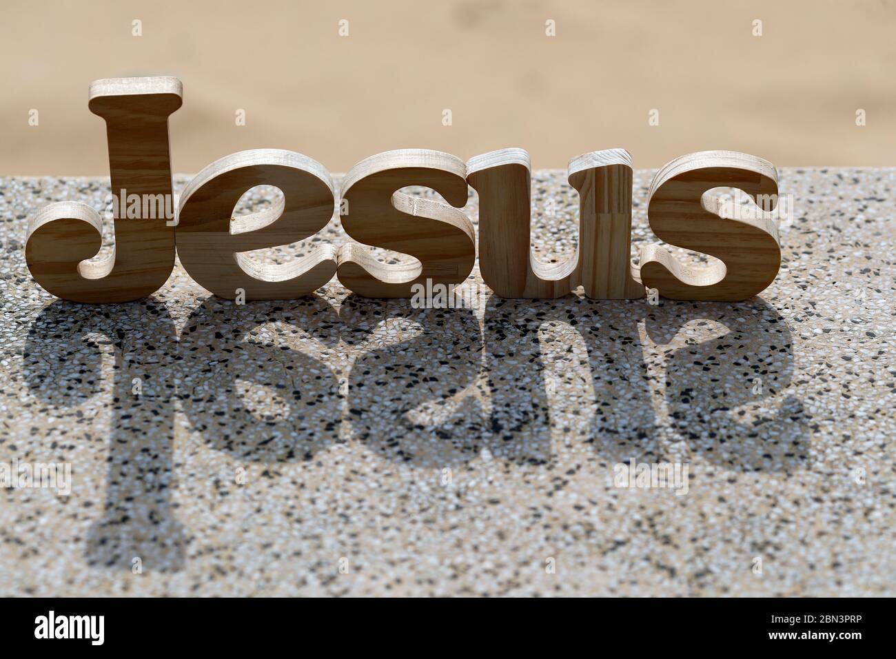 Wooden letters forming the word JESUS. Christian symbol Stock Photo - Alamy