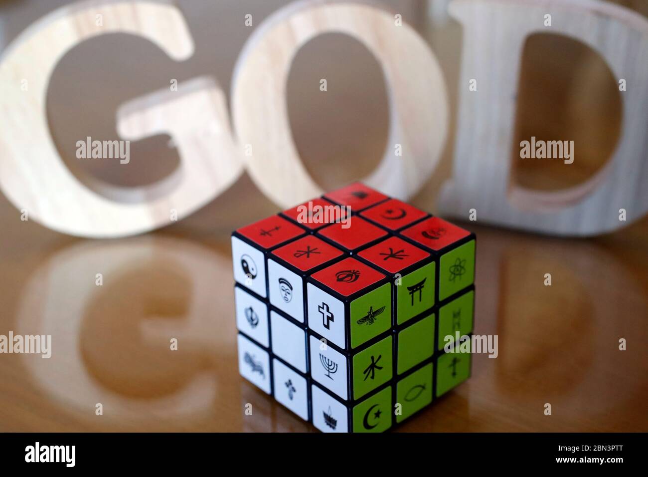 The word of GOD and Rubik's cube with religious symbols. Interreligious ...