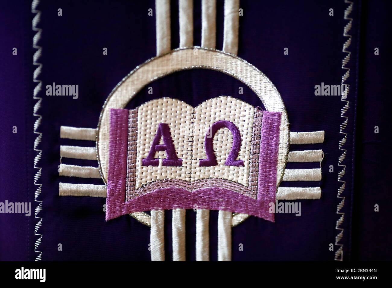 Purple roman chasuble with Alpha and Omega. Quy Nhon. Vietnam Stock ...