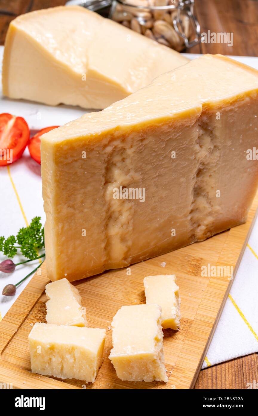 Big wedges of parmigiano-reggiano parmesan hard Italian cheese made ...