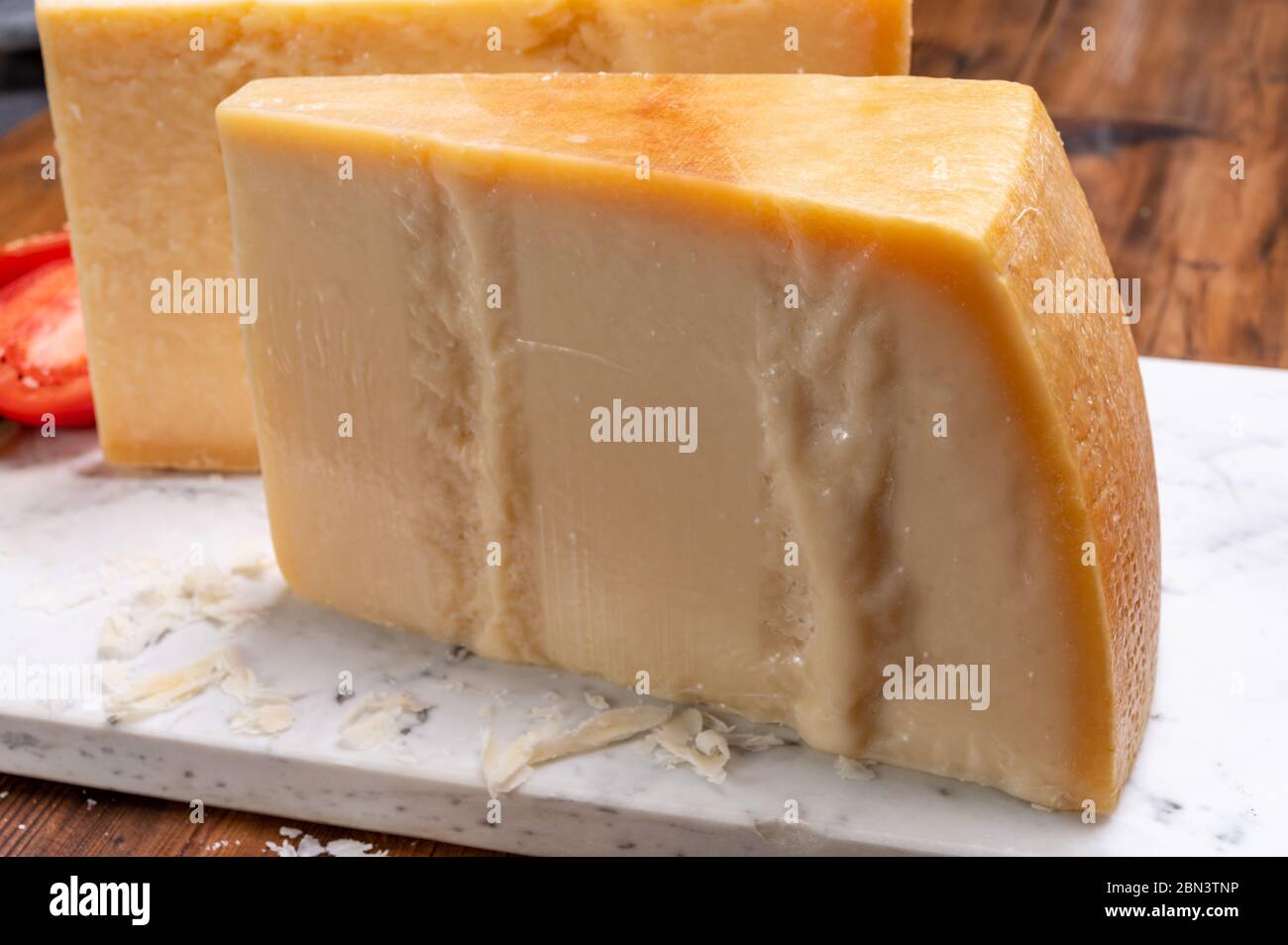 Big wedges of parmigiano-reggiano parmesan hard Italian cheese made ...