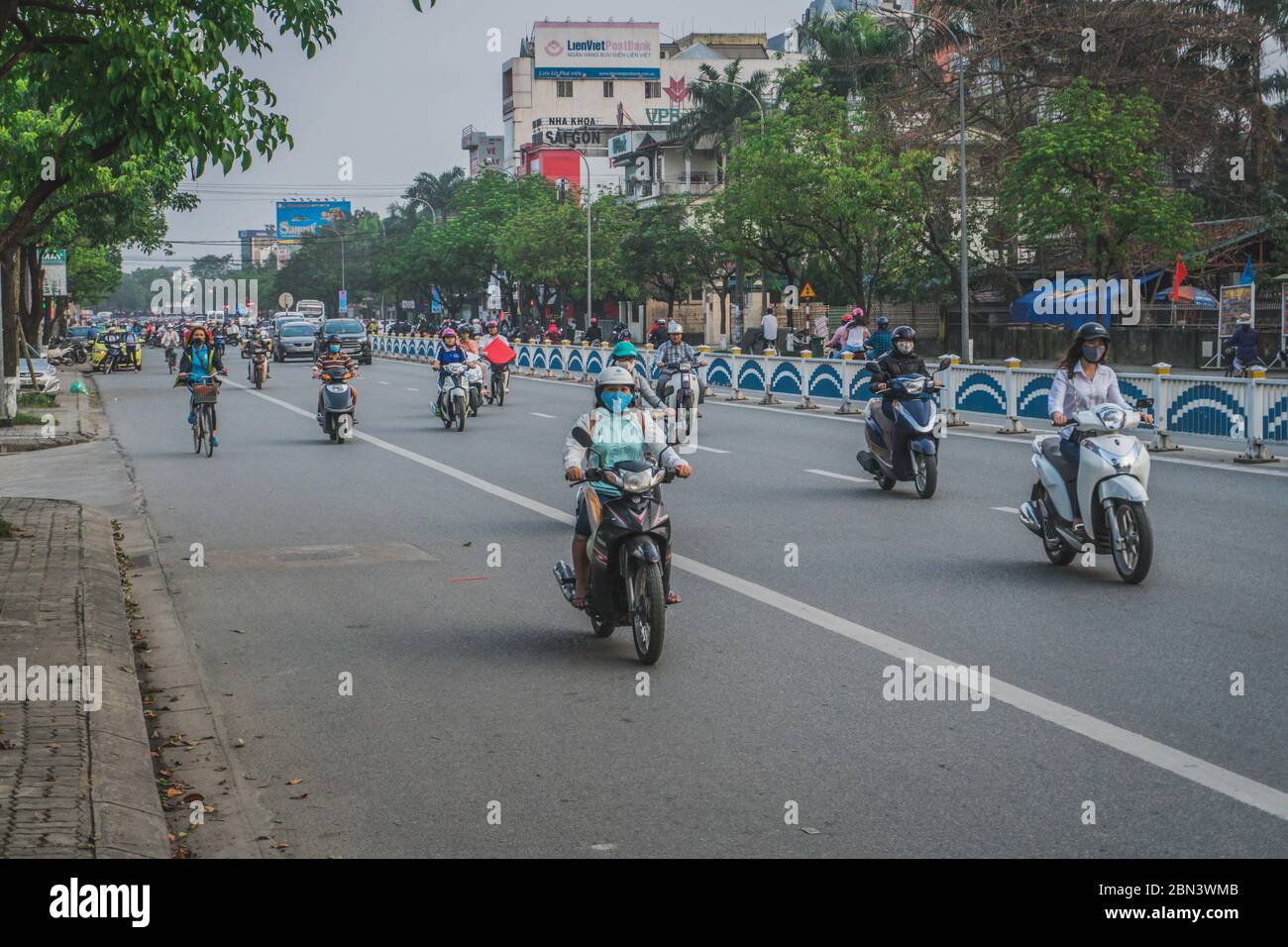 Busy Rush Hour Traffic In Vietnam. Hue, Vietnam - March 12, 2020 Stock ...