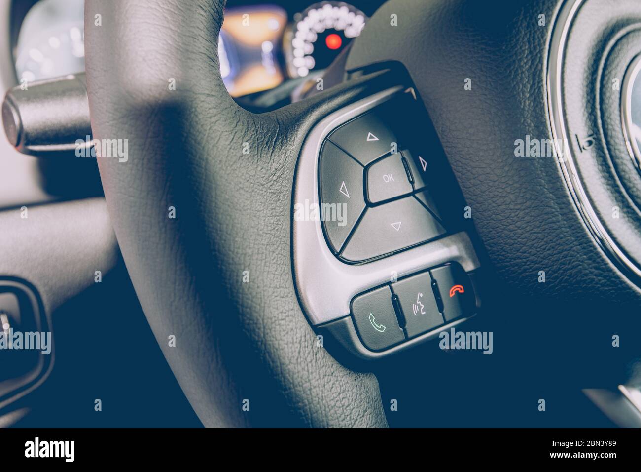 car interior details - steering wheel with controls Stock Photo - Alamy