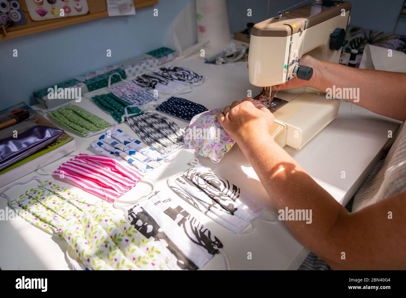 Woman making mask hi-res stock photography and images - Alamy