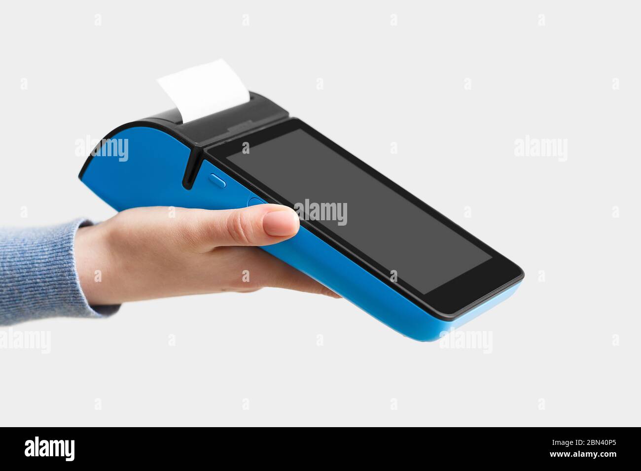 Self-isolation and payment of delivery from home. Female hand holds ...