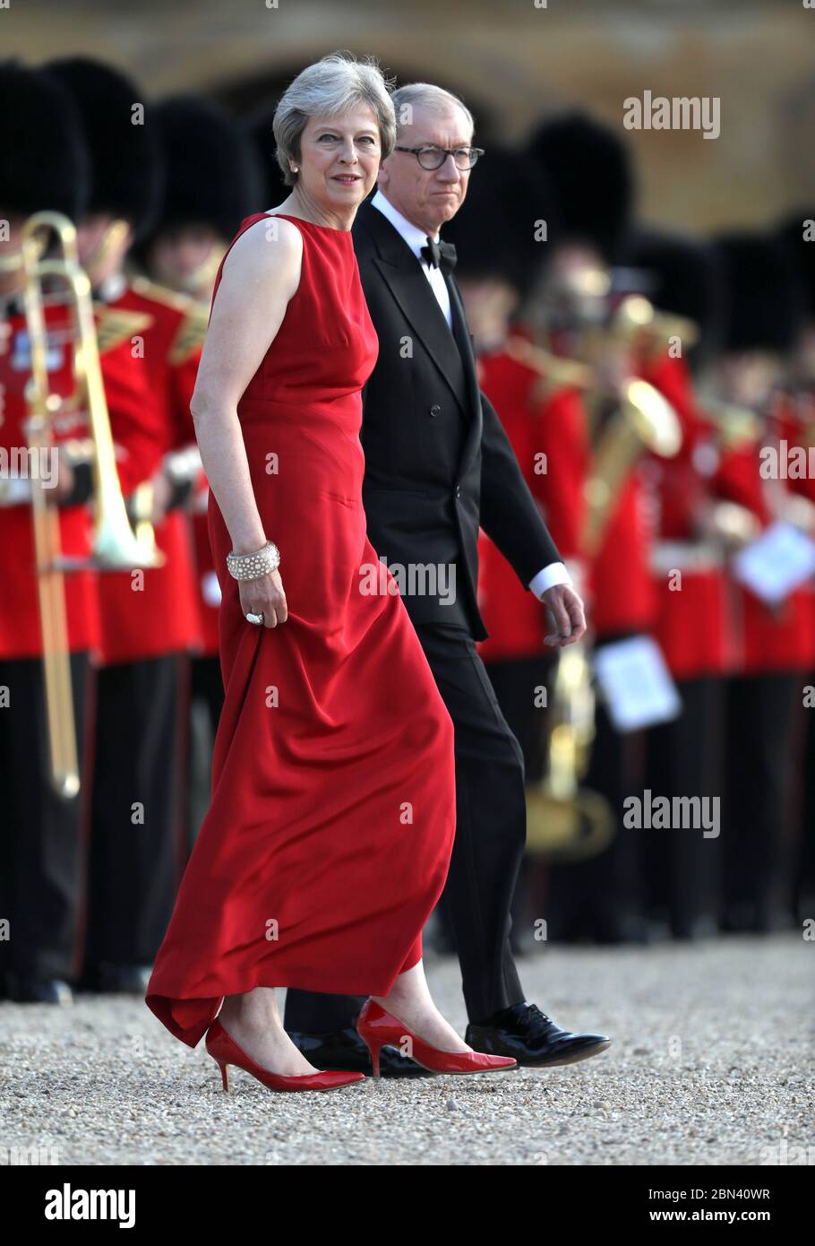 British Prime Minister Theresa May and her husband Philip May wait on ...