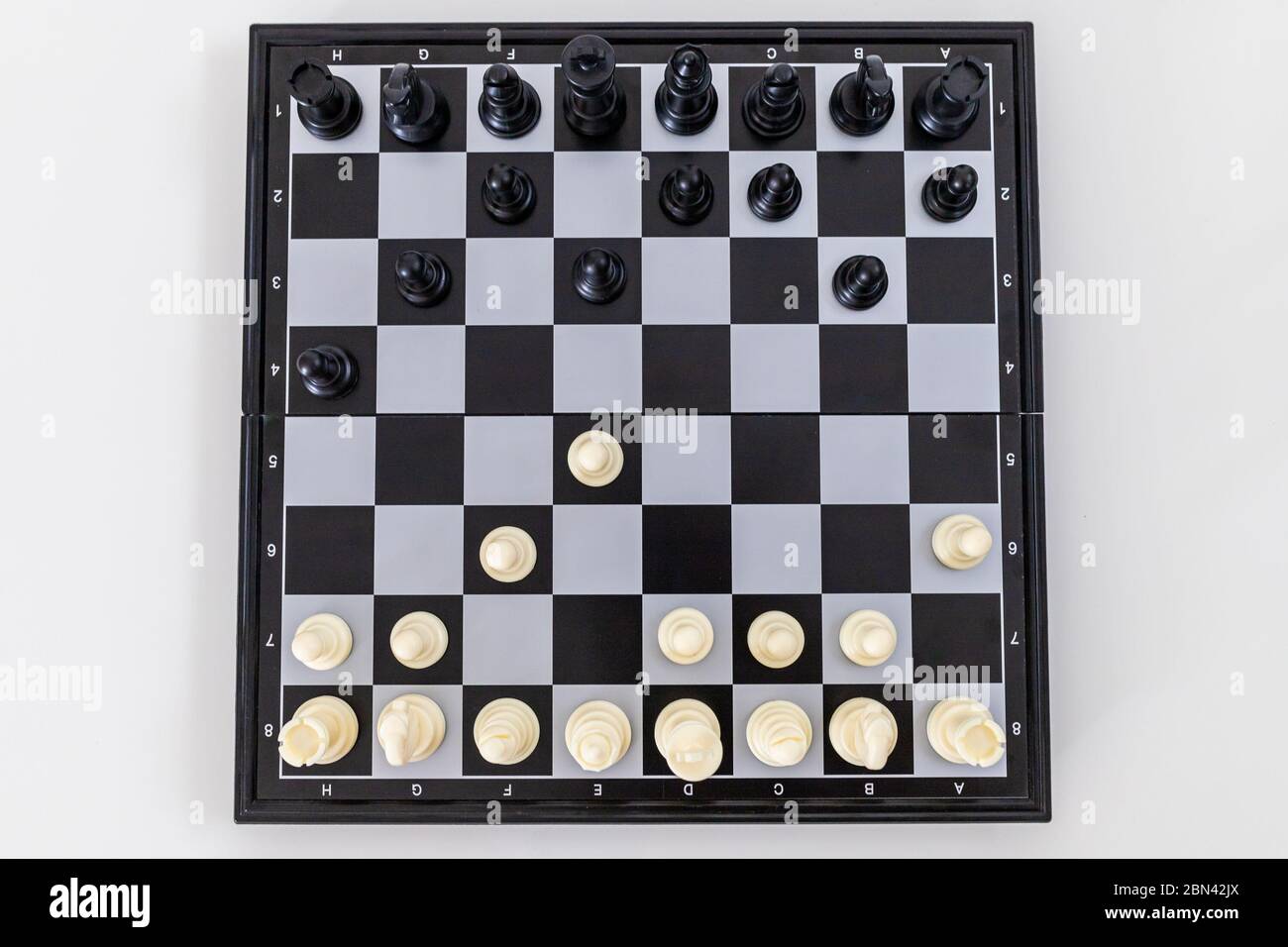 A typical chess set, showing the various pieces on the board Stock ...