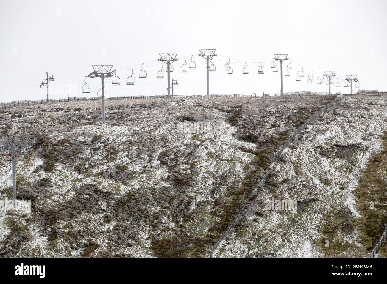 Snow and chairlifts at the Lecht Ski Centre in Aberdeenshire as wintry ...