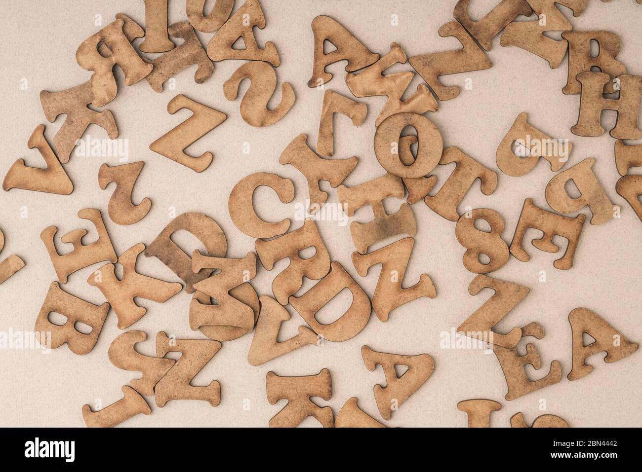 closeup of carved wooden alphabets as a background Stock Photo - Alamy