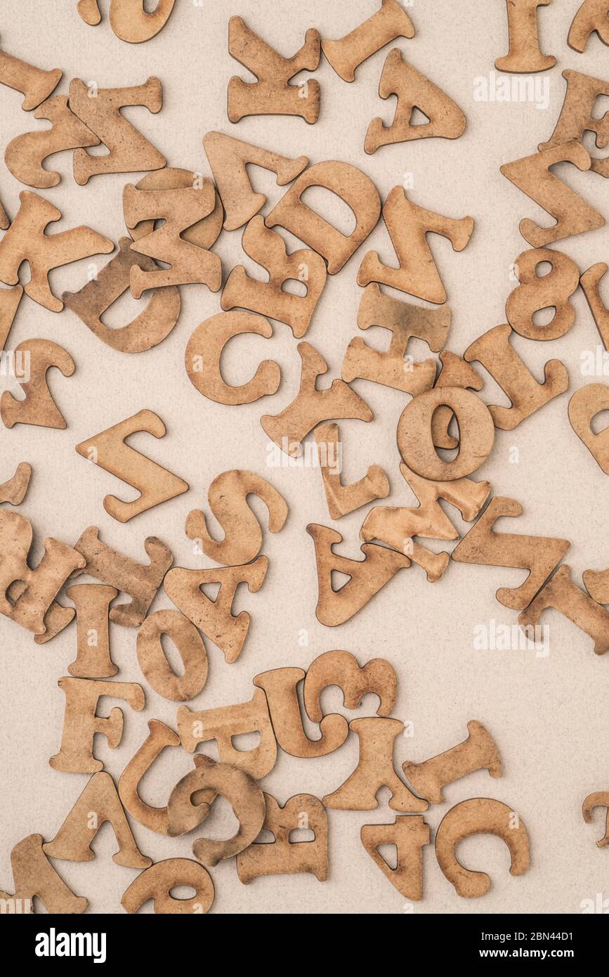 closeup of carved wooden alphabets as a background Stock Photo - Alamy