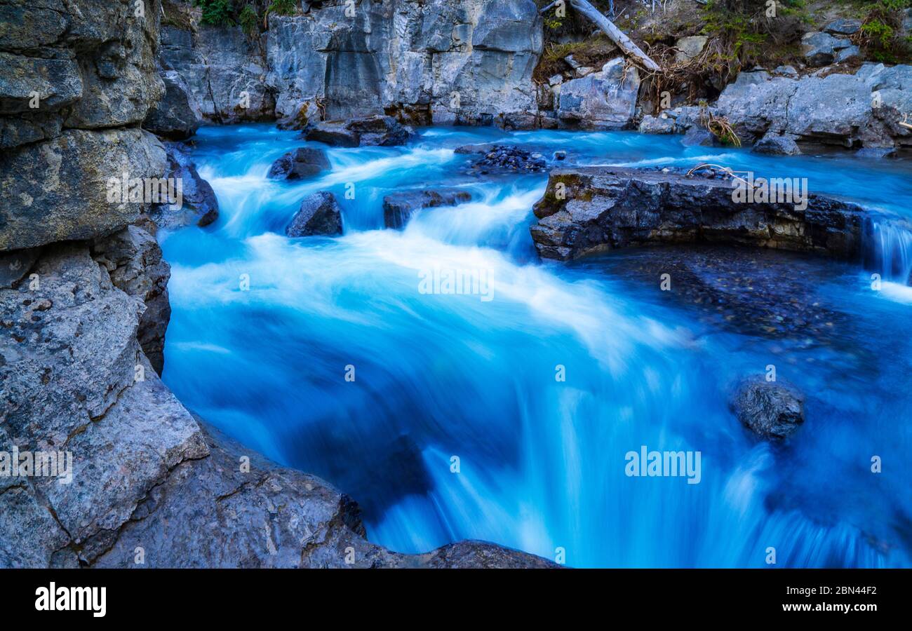 Pure Water In River In Nature Flowing Over Rocks Stock Photo - Alamy