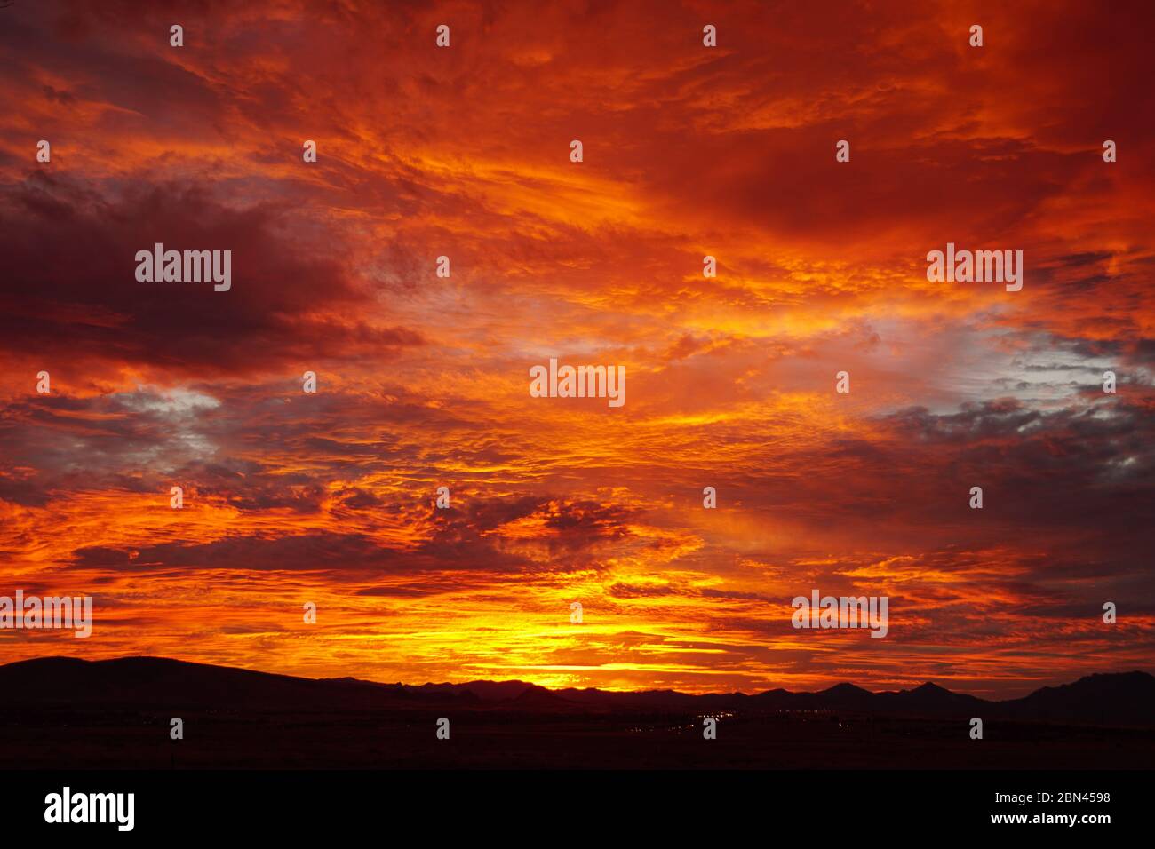 The fiery and intense colors of a mid summer Northern Arizona sunset ...