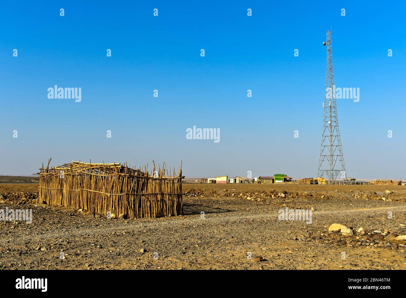 Micro-wave tower, in front traditional shelter of Afar nomads, Hamadela ...