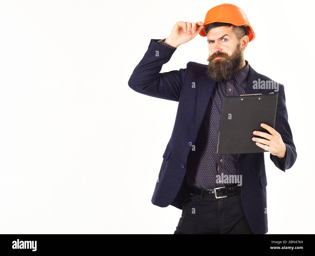 Building and architecture concept. Inspector holds building permit ...