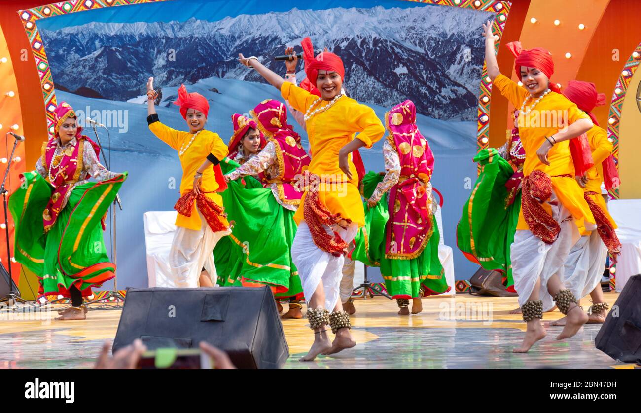 Young Indian Male and Female dancers performing regional/folk dance in ...