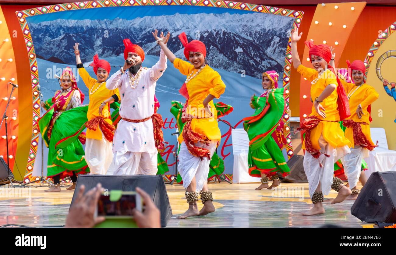 Young Indian Male and Female dancers performing regional/folk dance in ...
