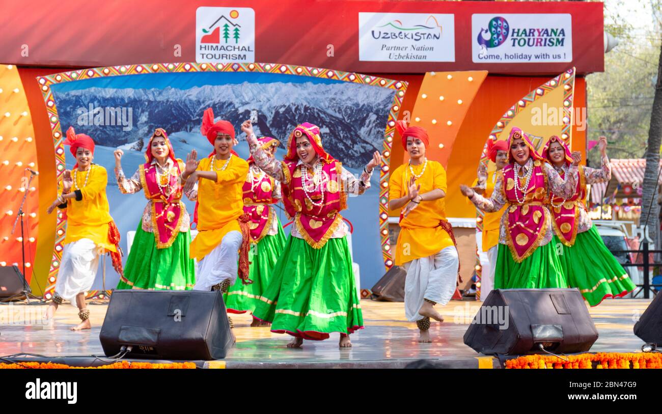 Young Indian Male and Female dancers performing regional/folk dance in ...