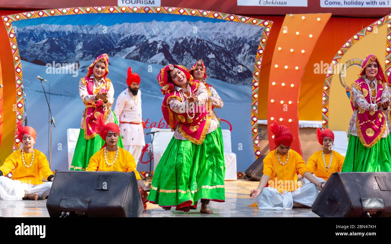 Young Indian Male and Female dancers performing regional/folk dance in ...