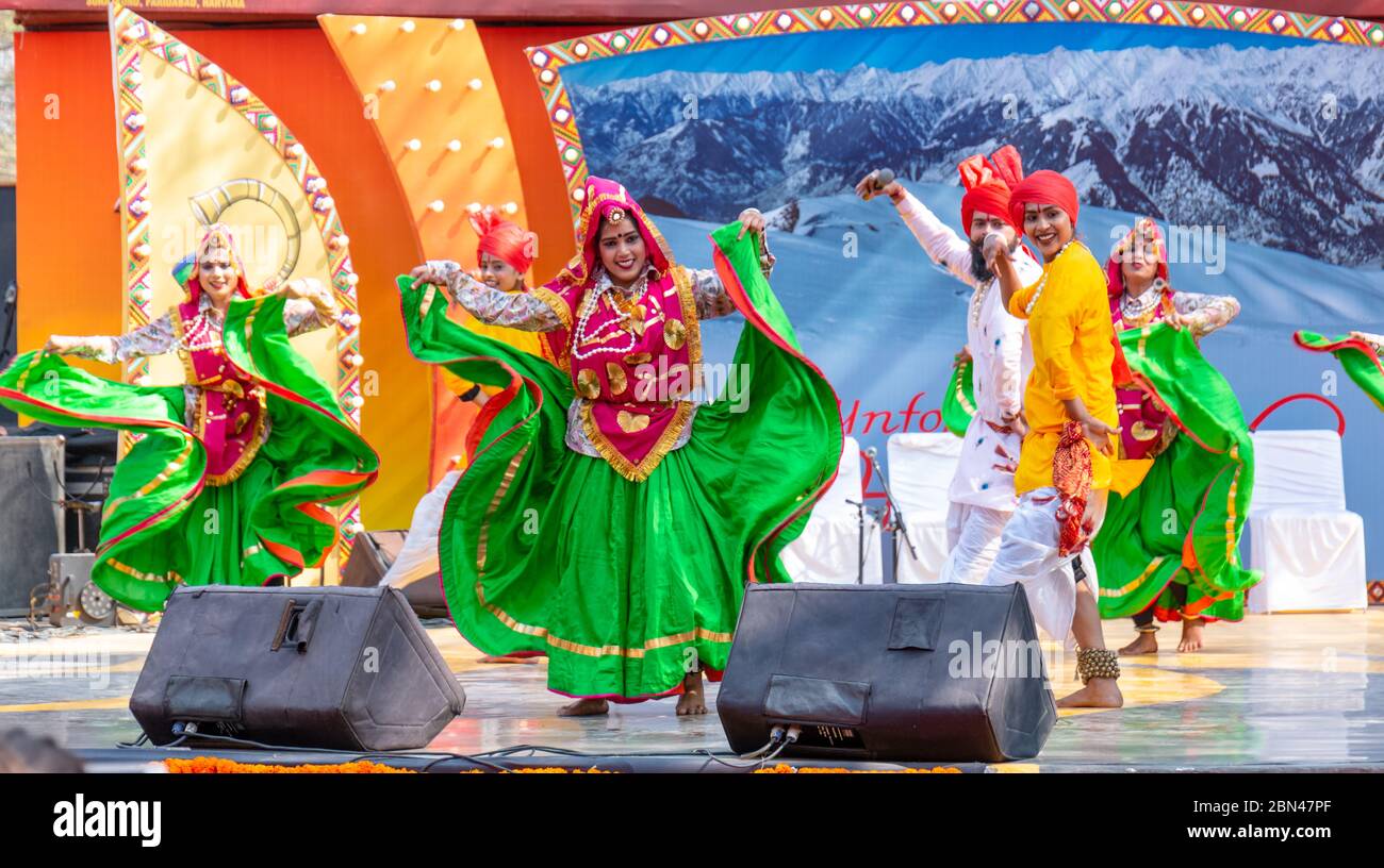 Young Indian Male and Female dancers performing regional/folk dance in ...
