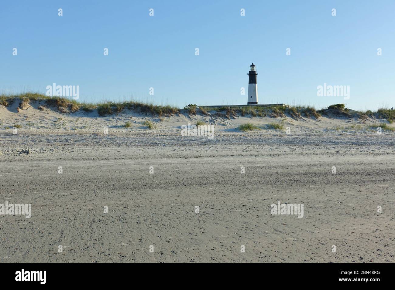 View of an empty sandy beach in Tybee Island, near Savannah, Georgia ...
