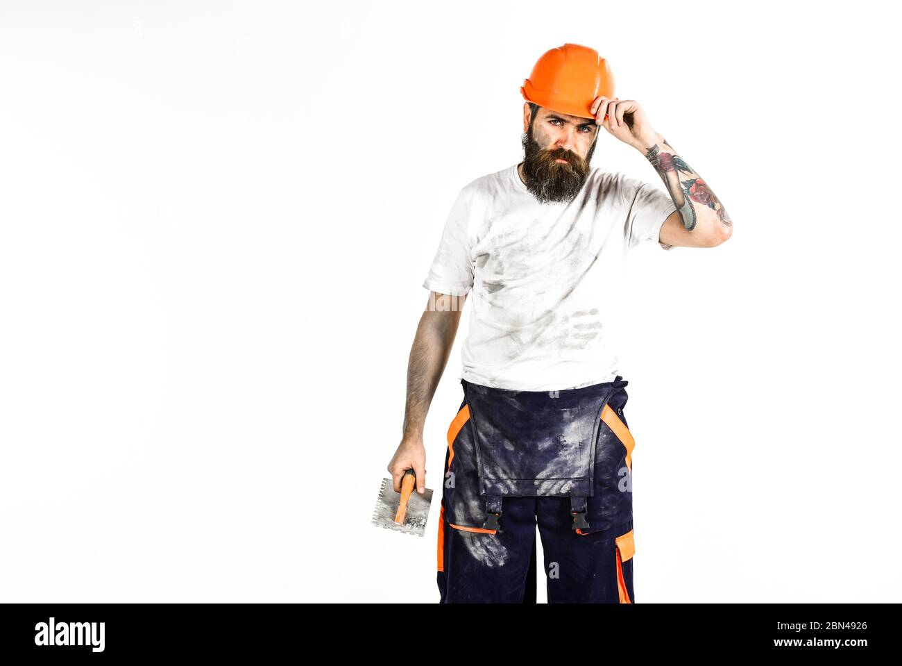 End of working day concept. Plasterer, repairman, foreman takes off ...