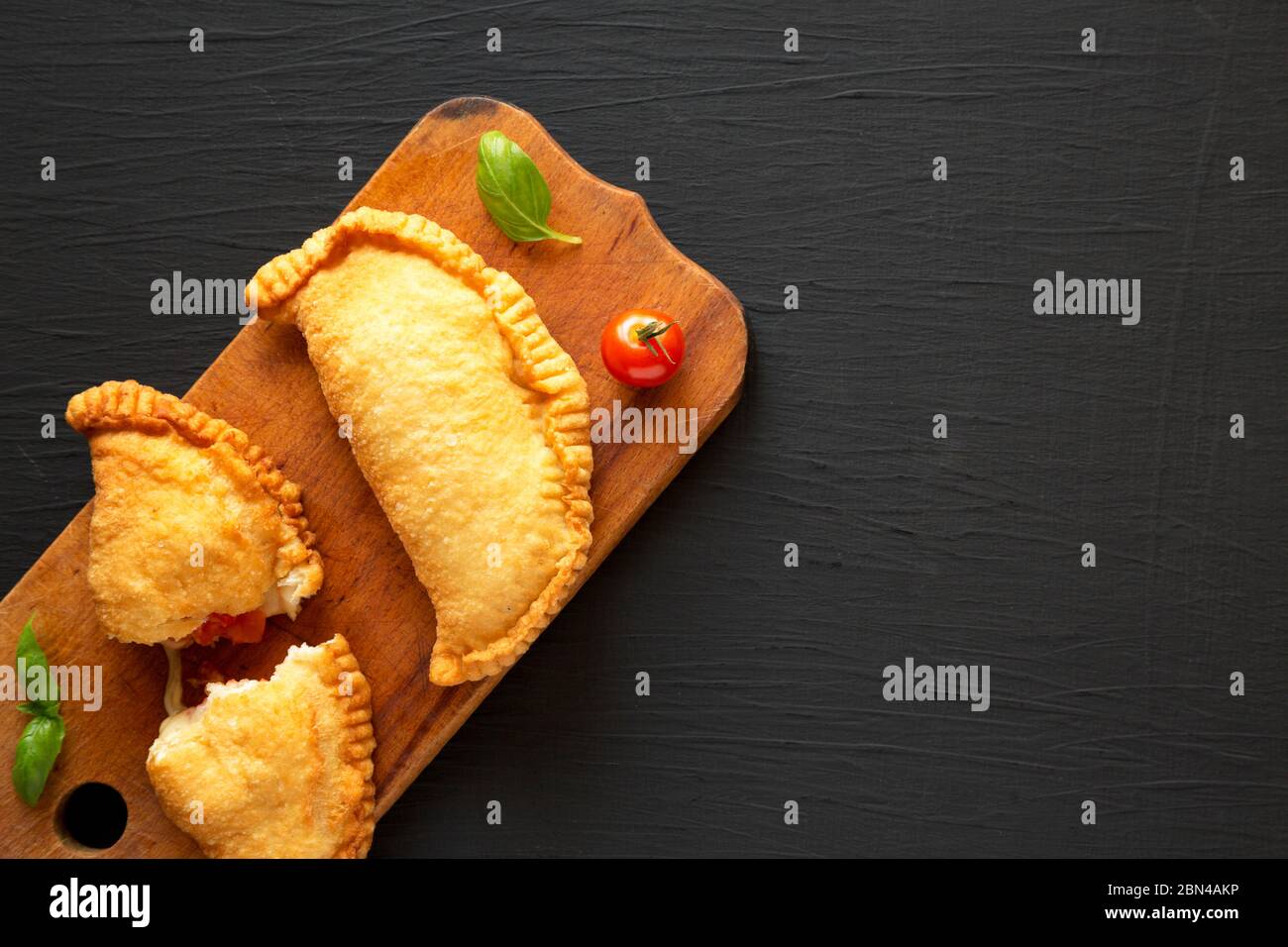Homemade Deep Fried Italian Panzerotti Calzone with tomato and ...