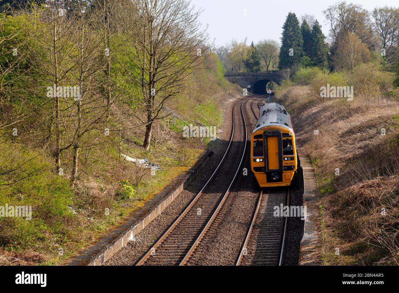 A passenger train approaches Chirk railway station, North East Wales ...
