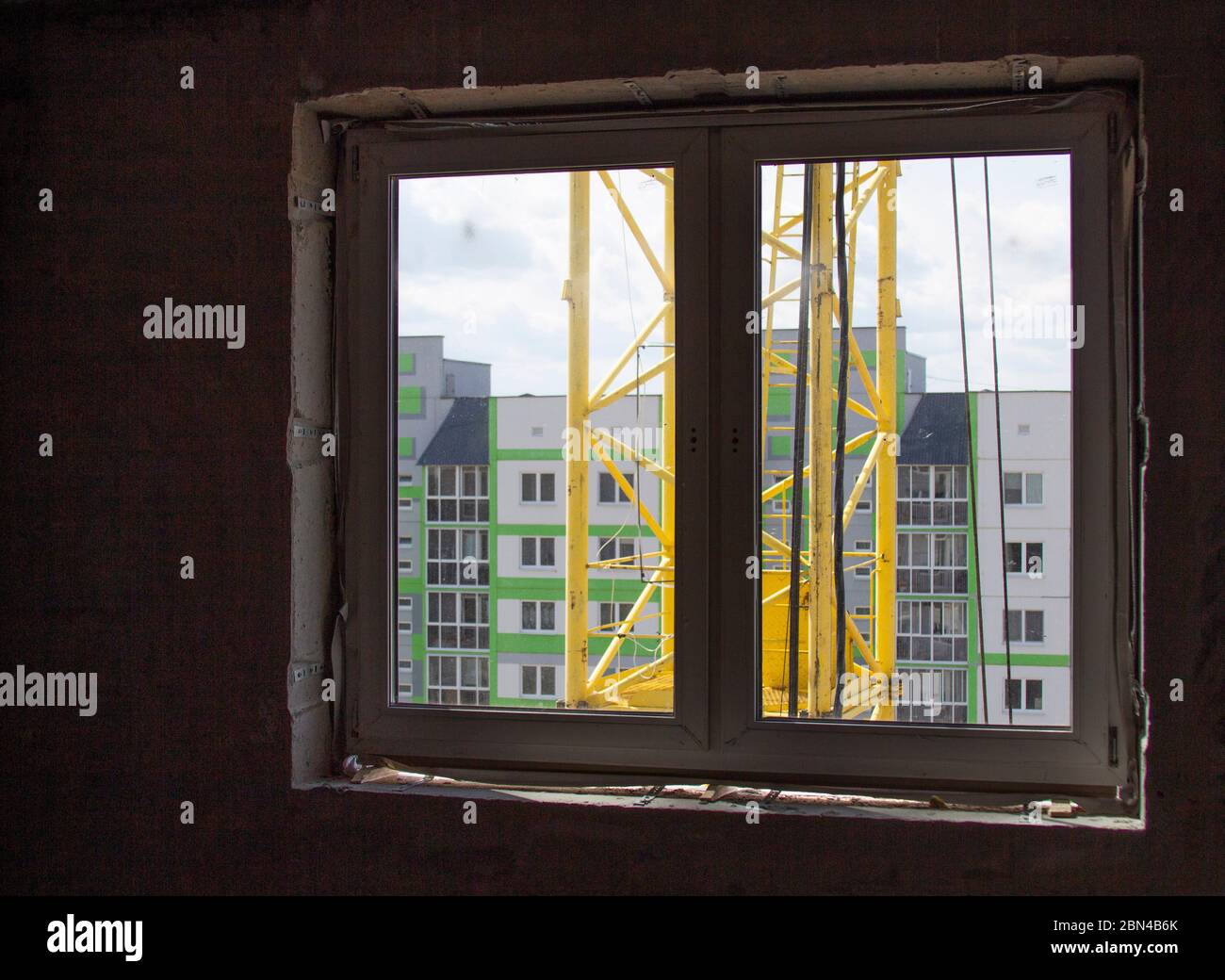 Loud construction site noise immission in opened one frame of white pvc ...