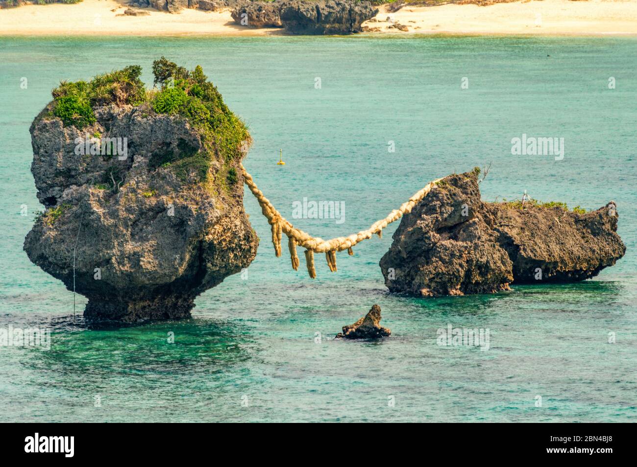Blue sea and volcanic rock formations on the coast of Okinawa island in ...