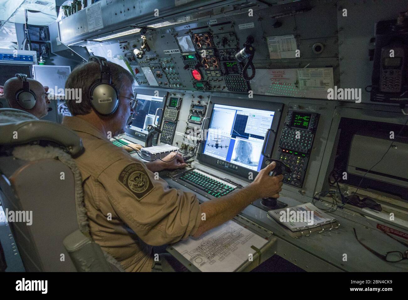 U.S. Navy officers from Naval Station Mayport board a flight with U.S ...