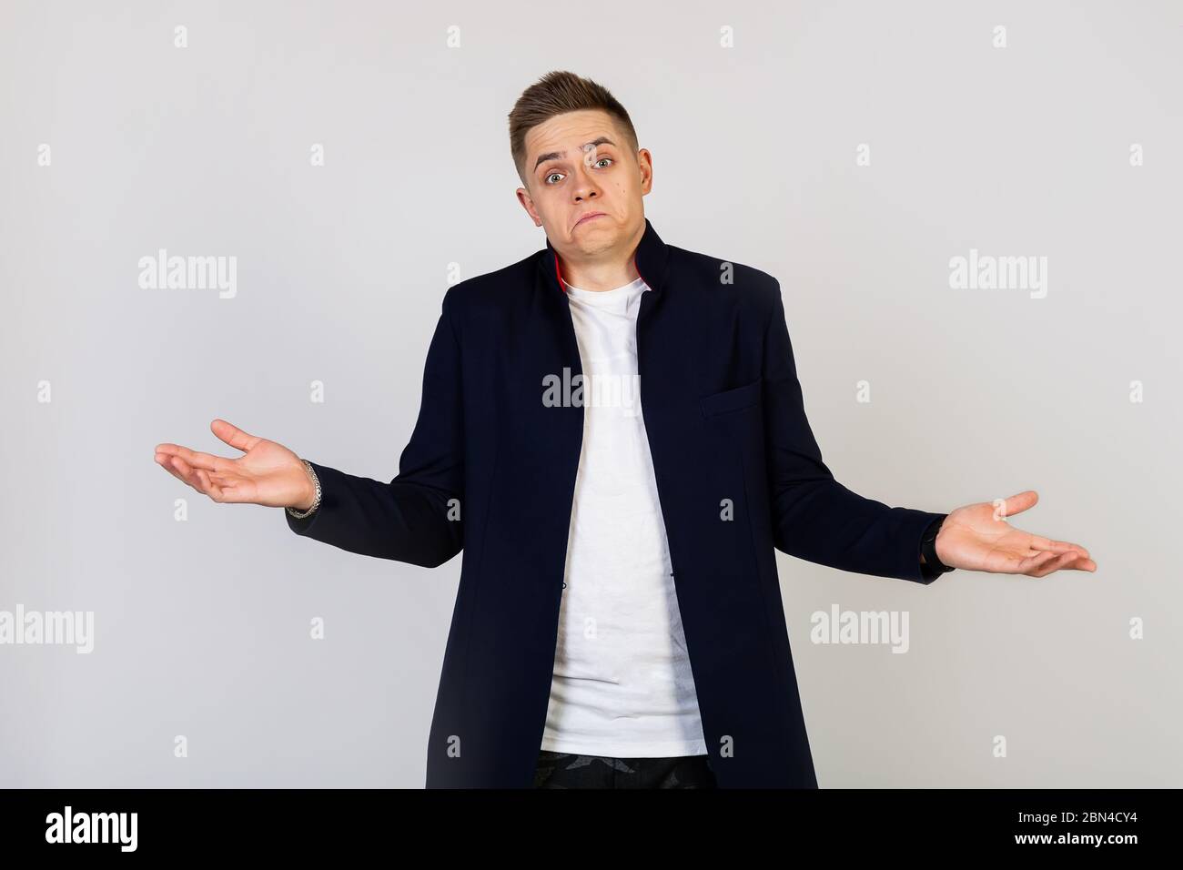 Young cute guy makes hi-res stock photography and images - Alamy