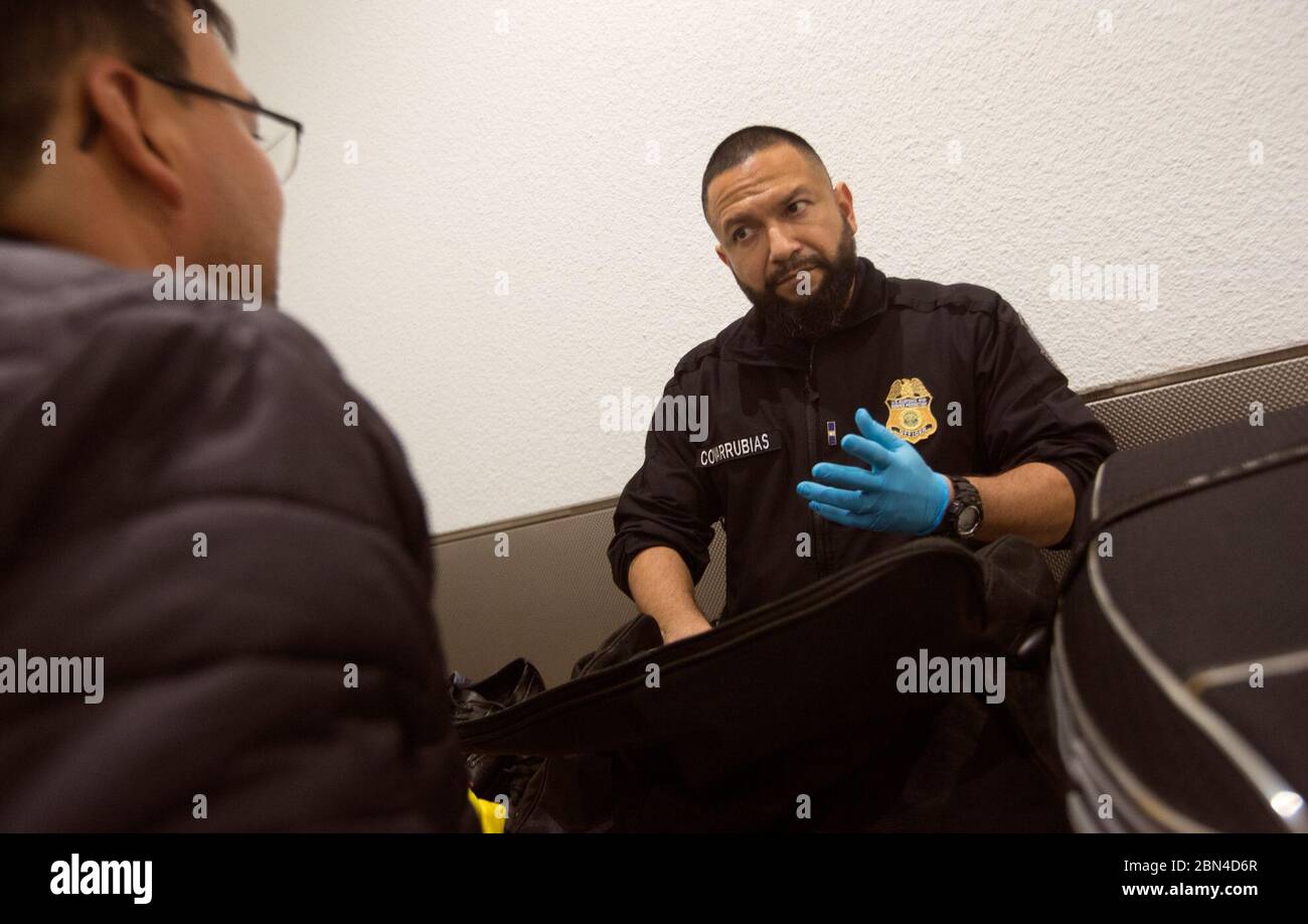 U.S. Customs and Border Protection officers conduct routine arrival ...