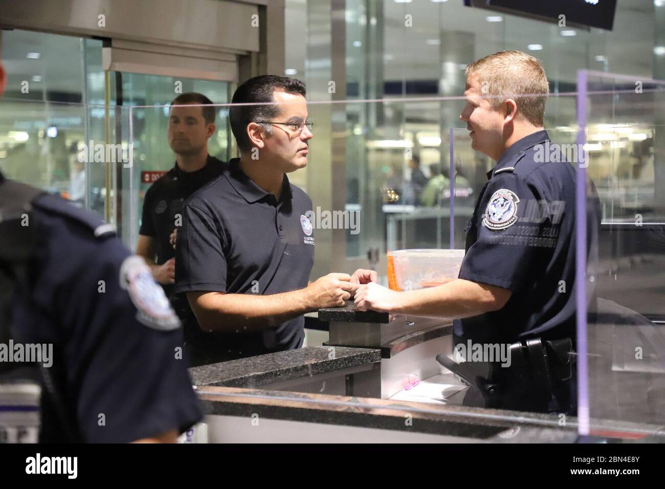 Acting Deputy Commissioner Perez speaks with a U.S. Customs and Border ...