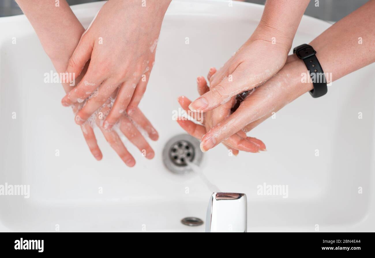 Family washing hi-res stock photography and images - Alamy