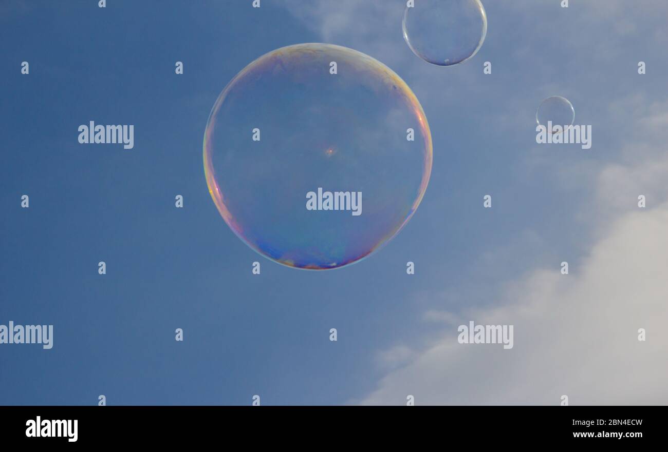Soap bubble floating in the air as the blue sky Stock Photo - Alamy