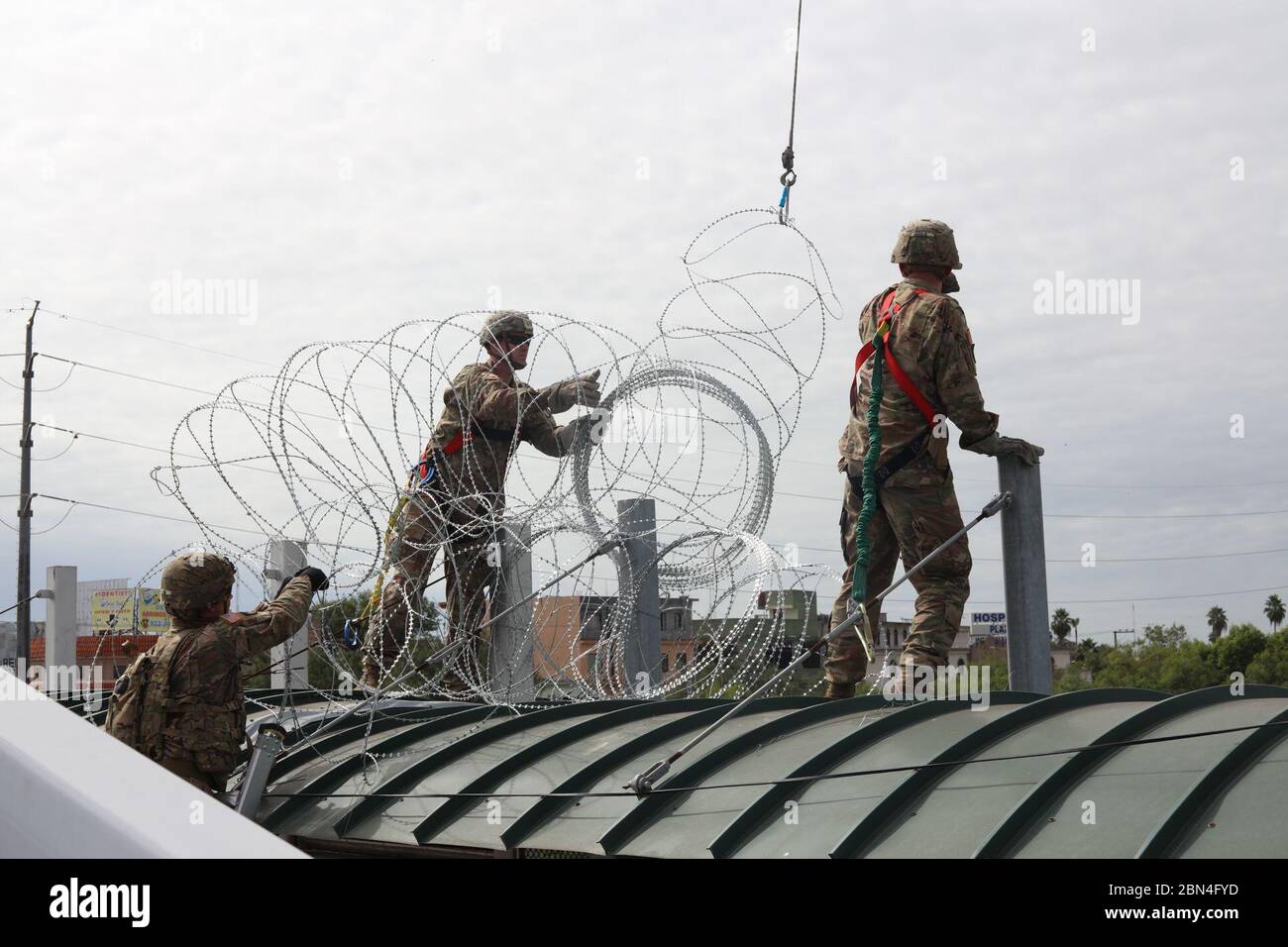 On November 2, 2018, U.S. Army North soldiers deployed concertina wire ...