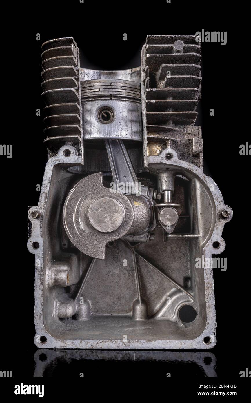 Four-stroke internal combustion engine in section shown. Petrol engine ...