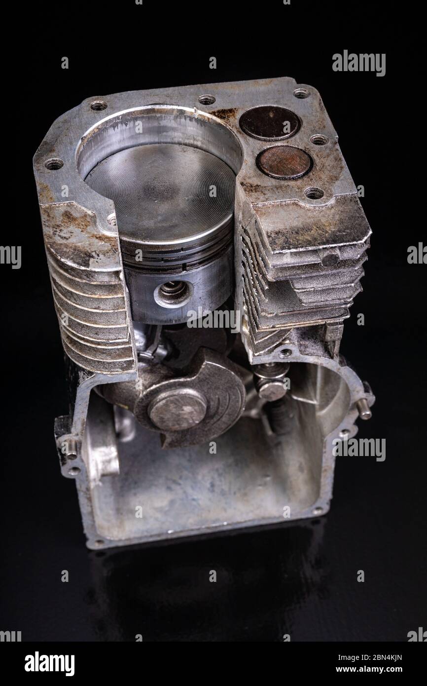 Four-stroke internal combustion engine in section shown. Petrol engine ...