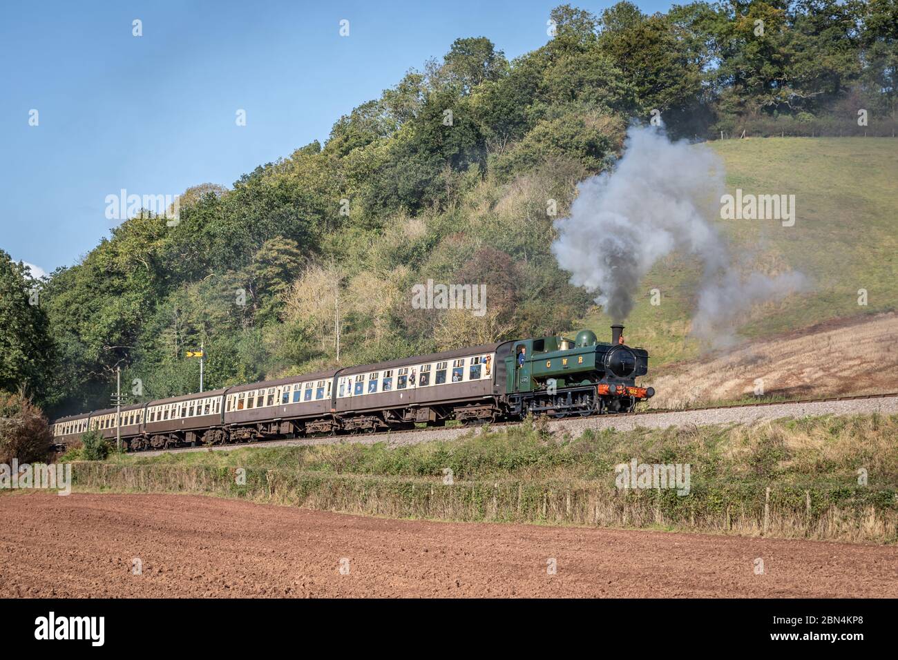 GWR '57xx' 0-6-0 No. 4612 passes Castle Hill on the West Somerset ...