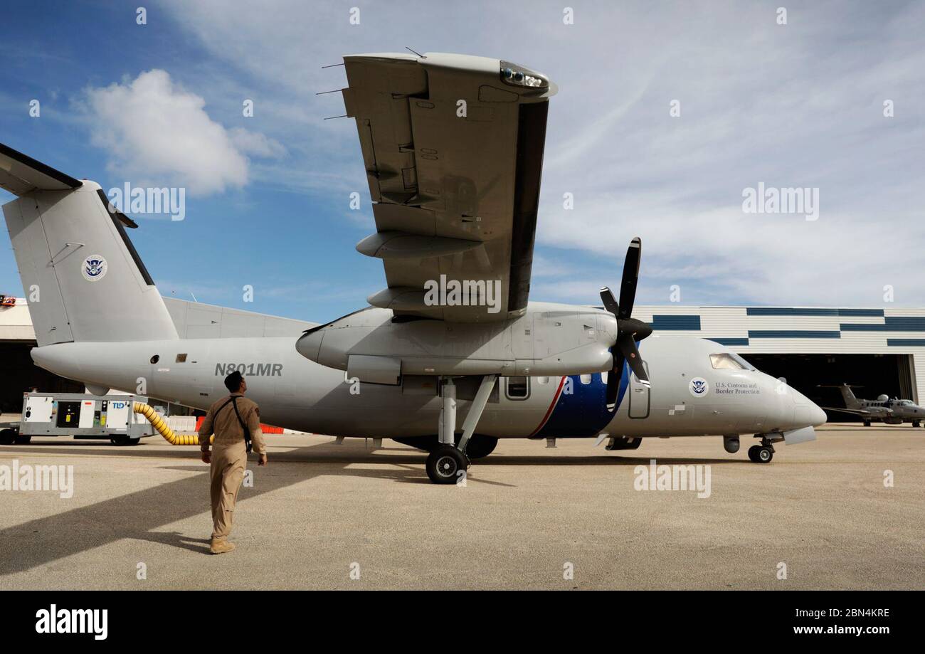 A U.S. Customs and Border Protection (CBP) air interdiction agent ...