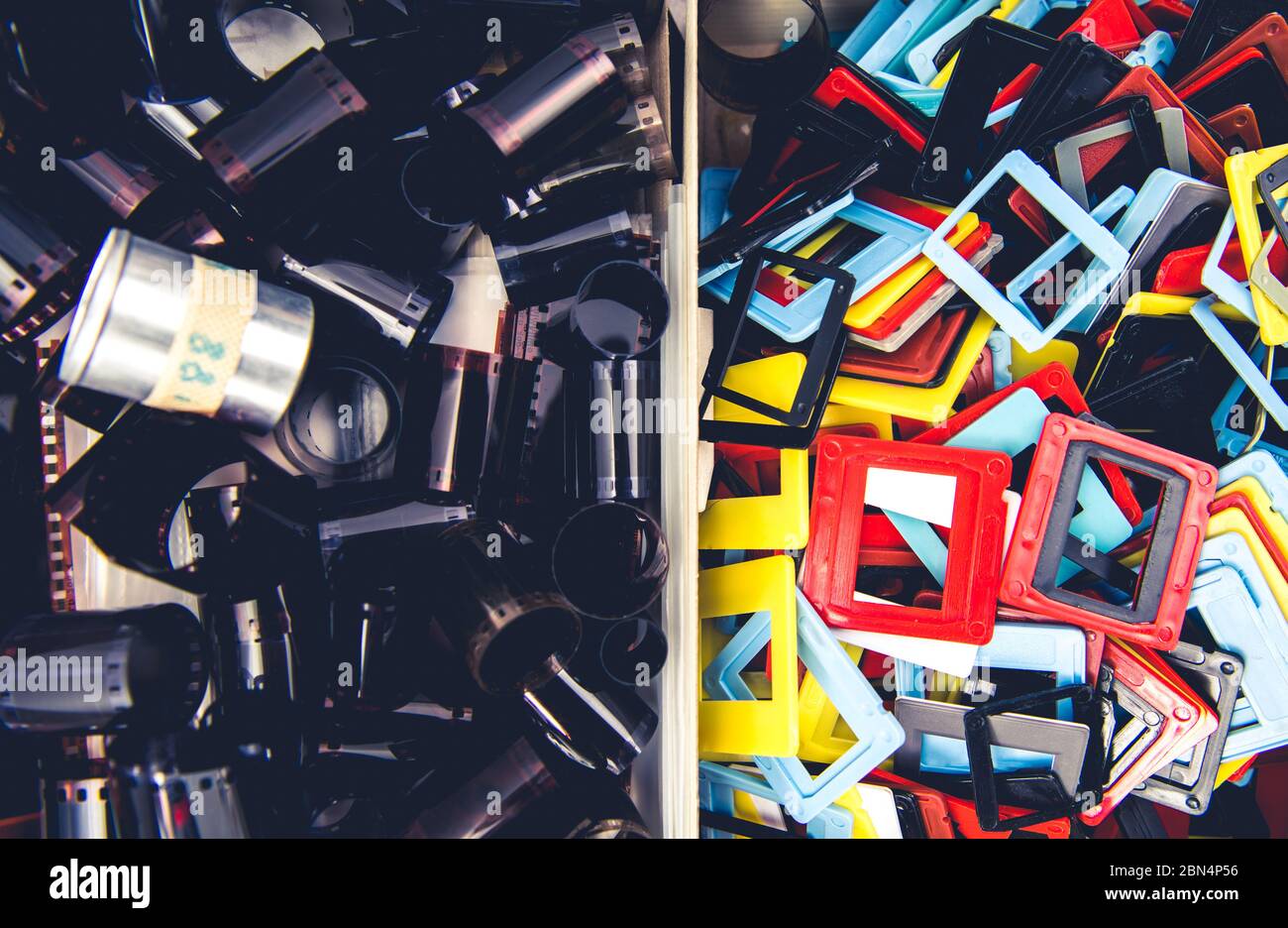 Two Larger Bins Filled With 35mm Negative Film Rolls Silver Containers ...