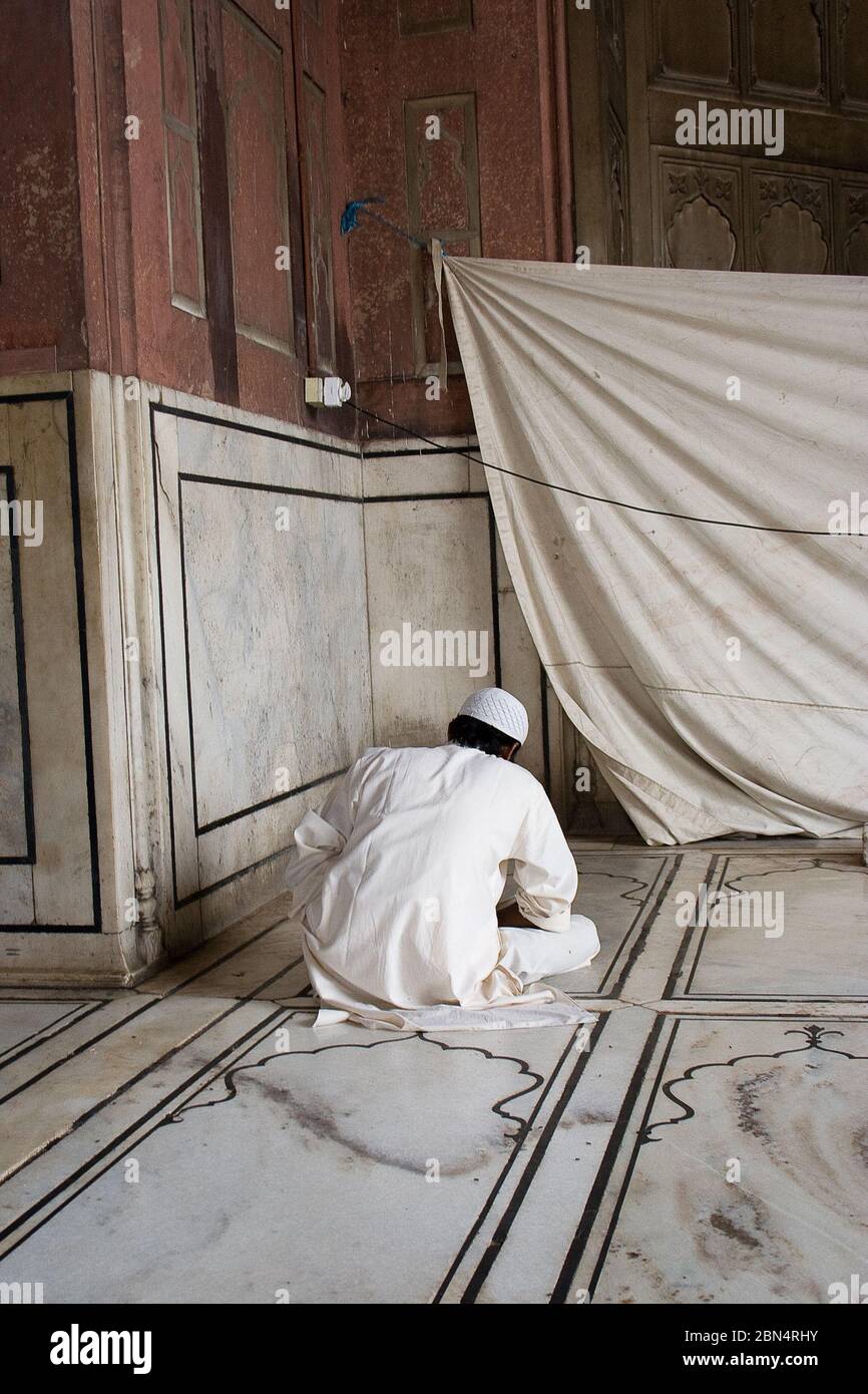 Delhi, India - July 29 2012 - Man Praying Inside Jama Masjid Mosque ...