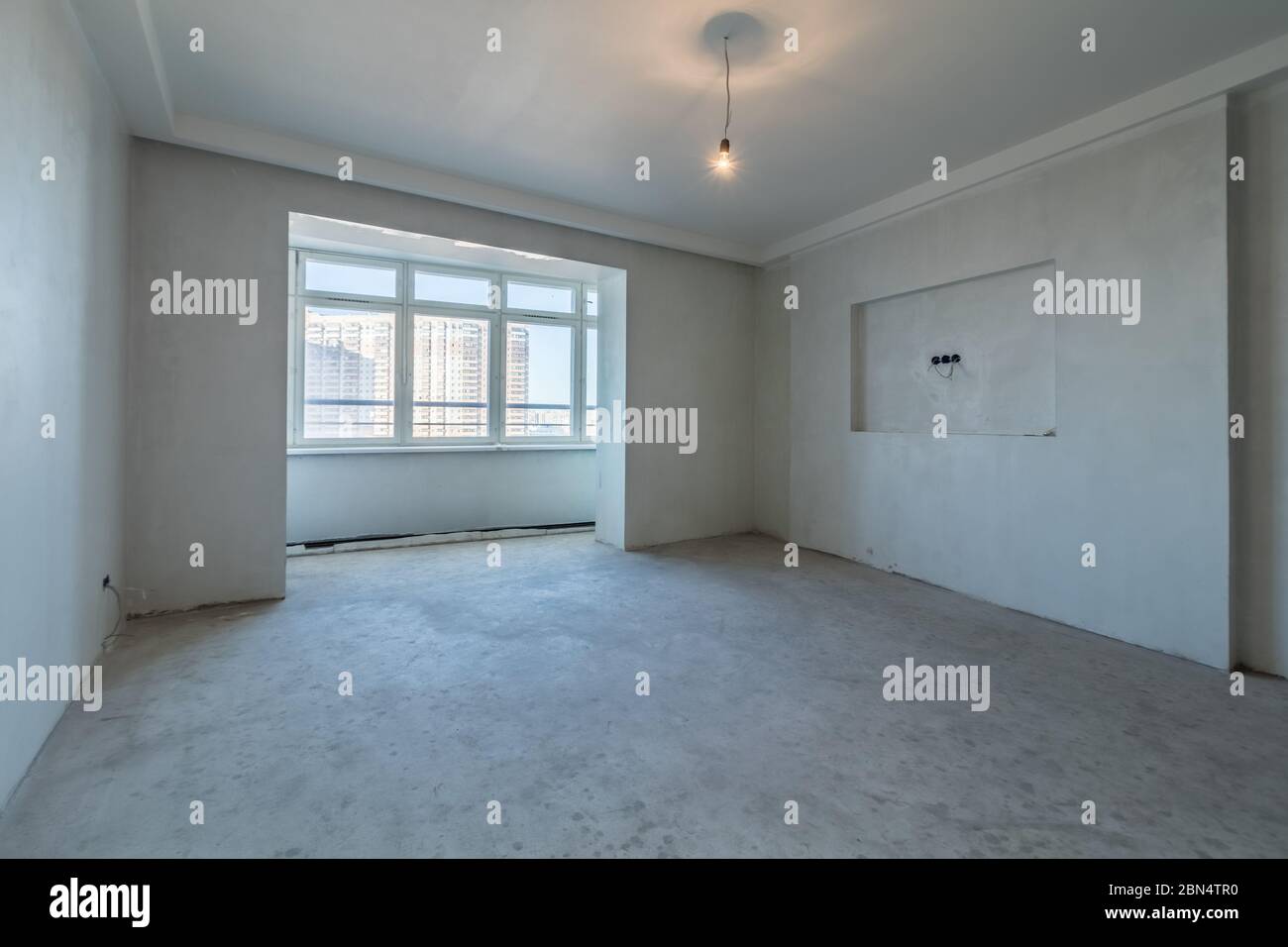 Unfinished modern building interior empty room ready for renovation and ...