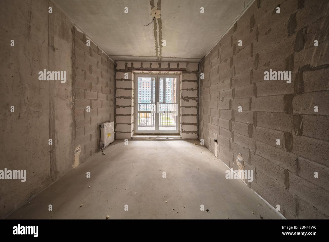 Unfinished modern building interior empty room ready for renovation and ...