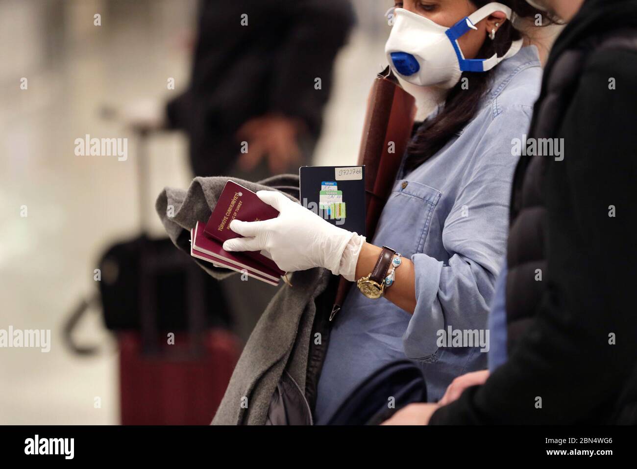 On March 18, 2020, international travelers arrived at Dulles ...