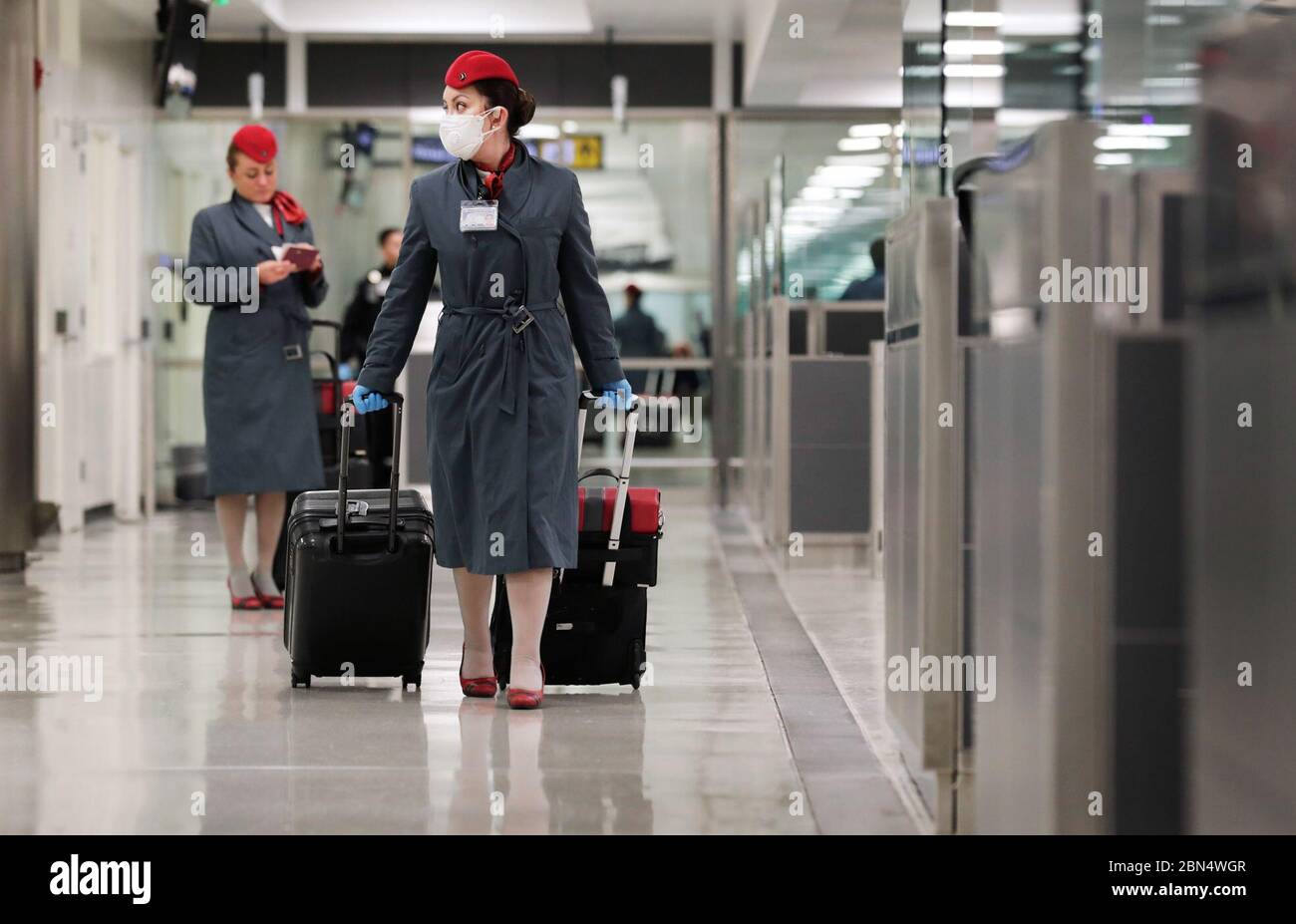 On March 18, 2020, a flight attendant wearing personal protective ...