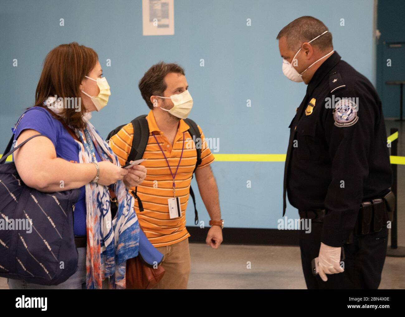 U.S. Customs and Border Protection (CBP) officers wore personal ...
