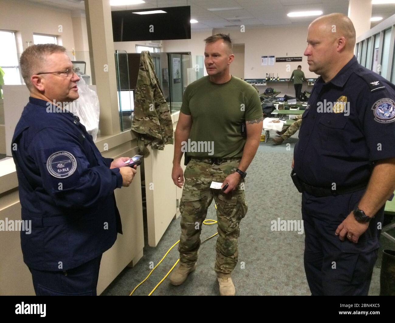 U.S. Border Patrol BORSTAR Alpha Team Leader Raymond Mandel and CBP ...